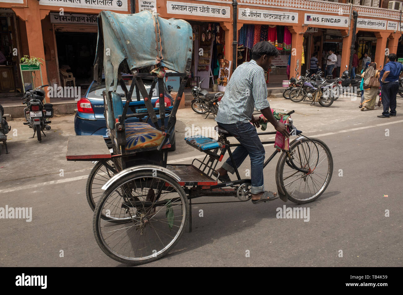 Man driving bicycle hi-res stock photography and images - Alamy