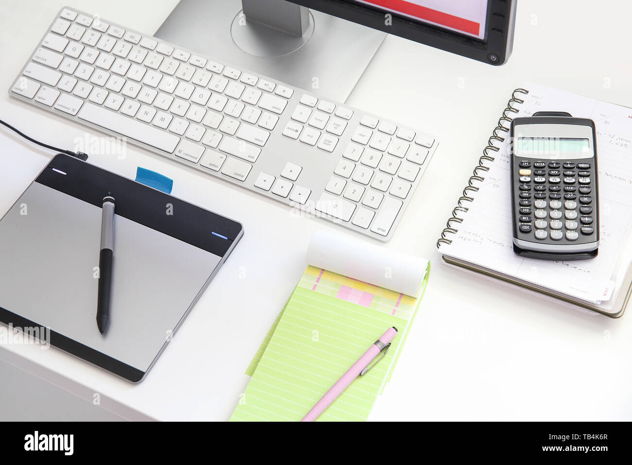 Office Workplace with a Computer, Devices, and a Notebook Stock Photo ...