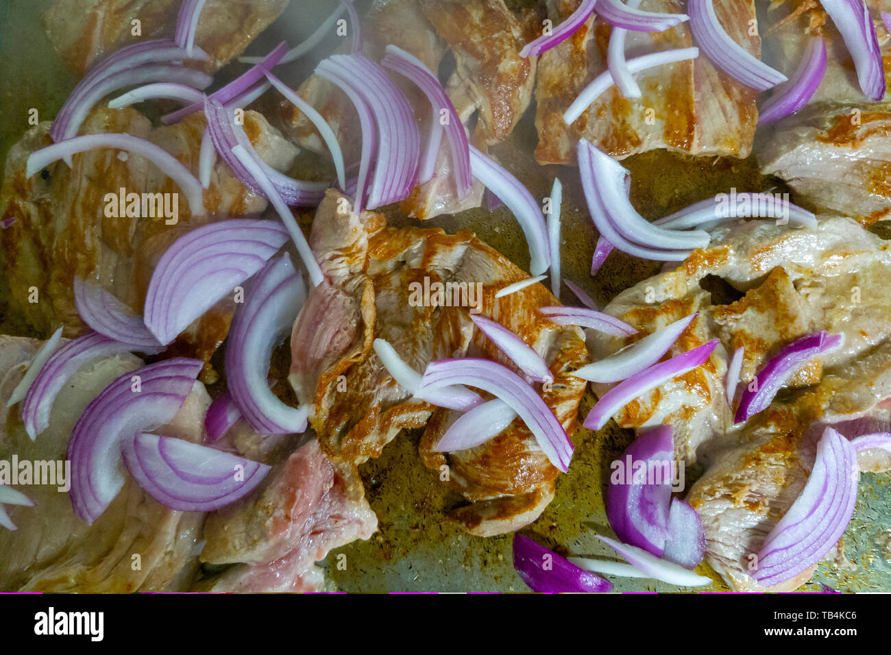 grilled pork fillet with onion Stock Photo - Alamy