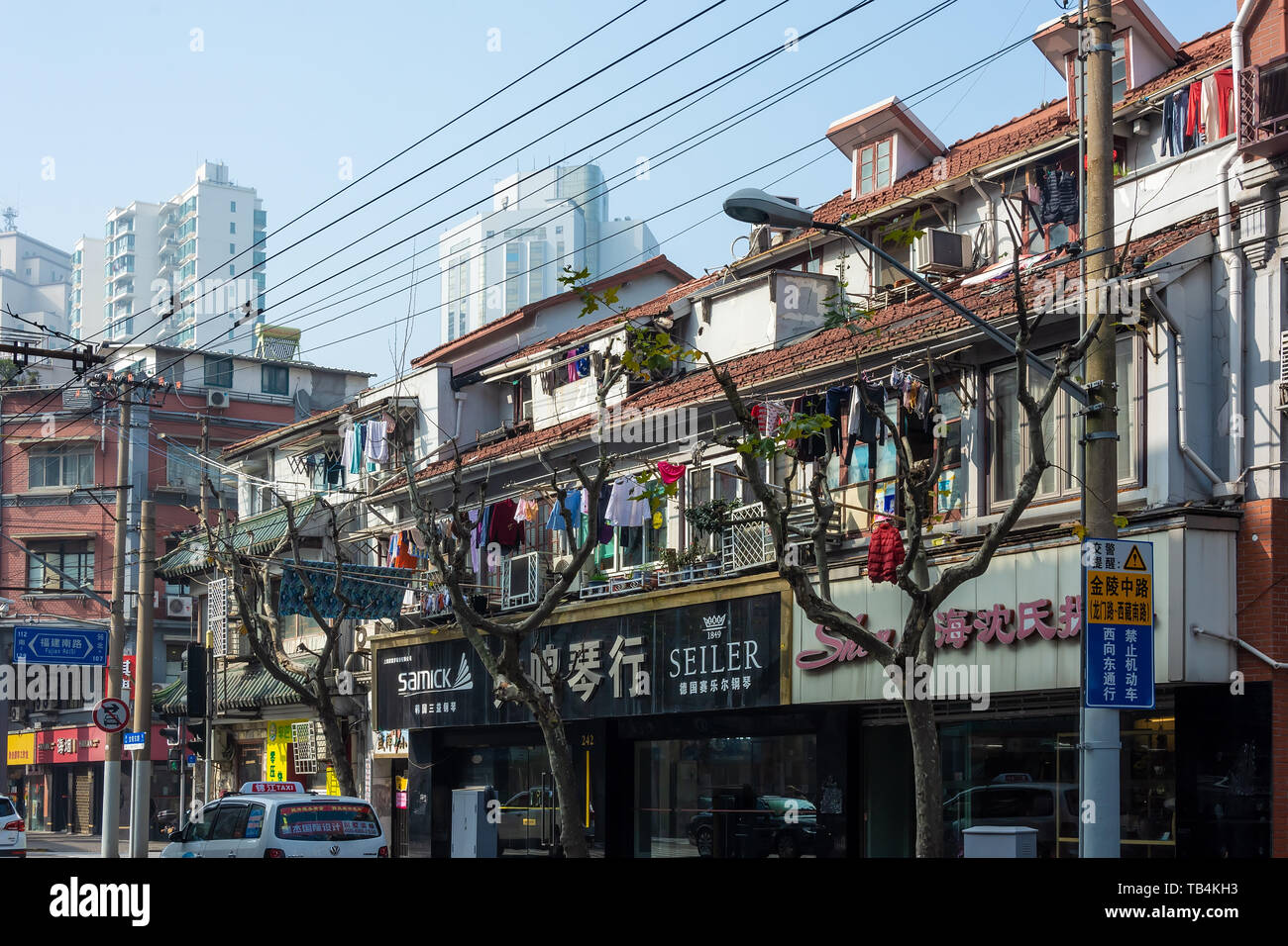 Living Scene on the Streets of Shanghai with Houses Stock Photo - Alamy