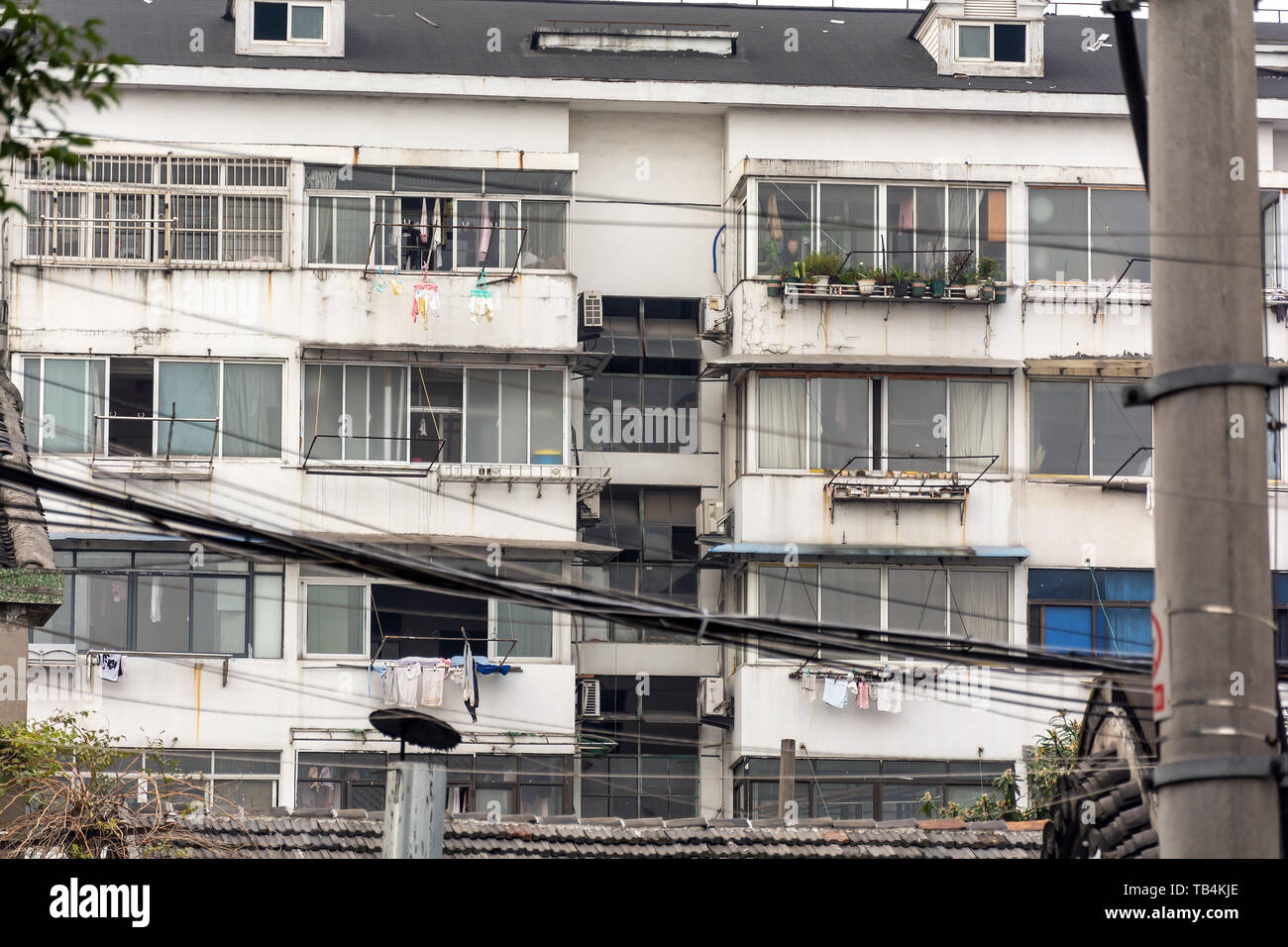 Living Scene on the Streets of Shanghai with Houses Stock Photo - Alamy