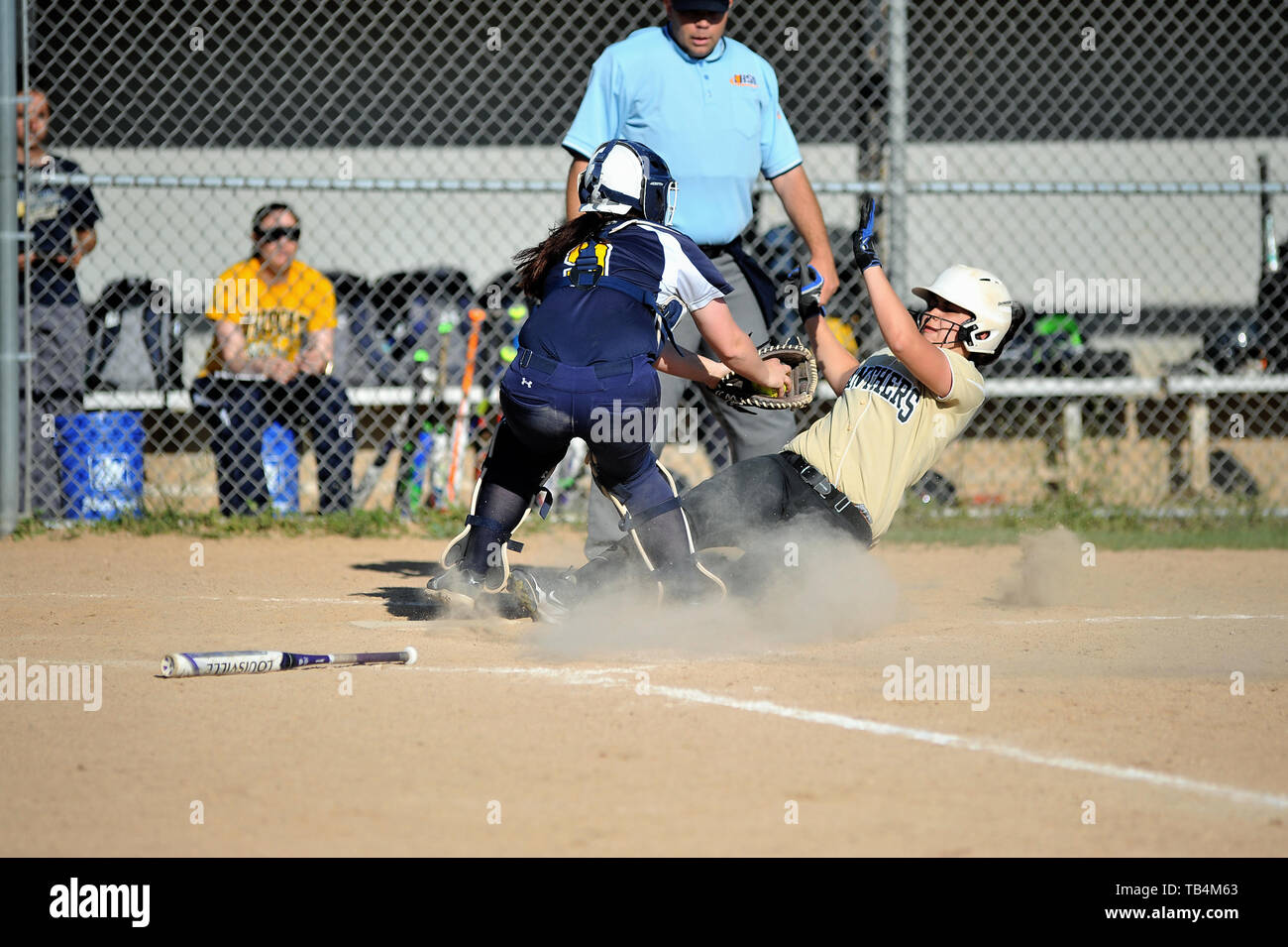 Girl softball player sliding into base hi-res stock photography and ...