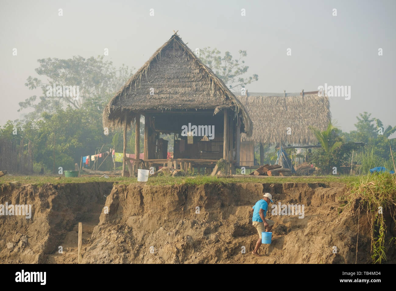 Misty morning in the Ucayali River seen from the ferry Iquitos-Pucallpa ...