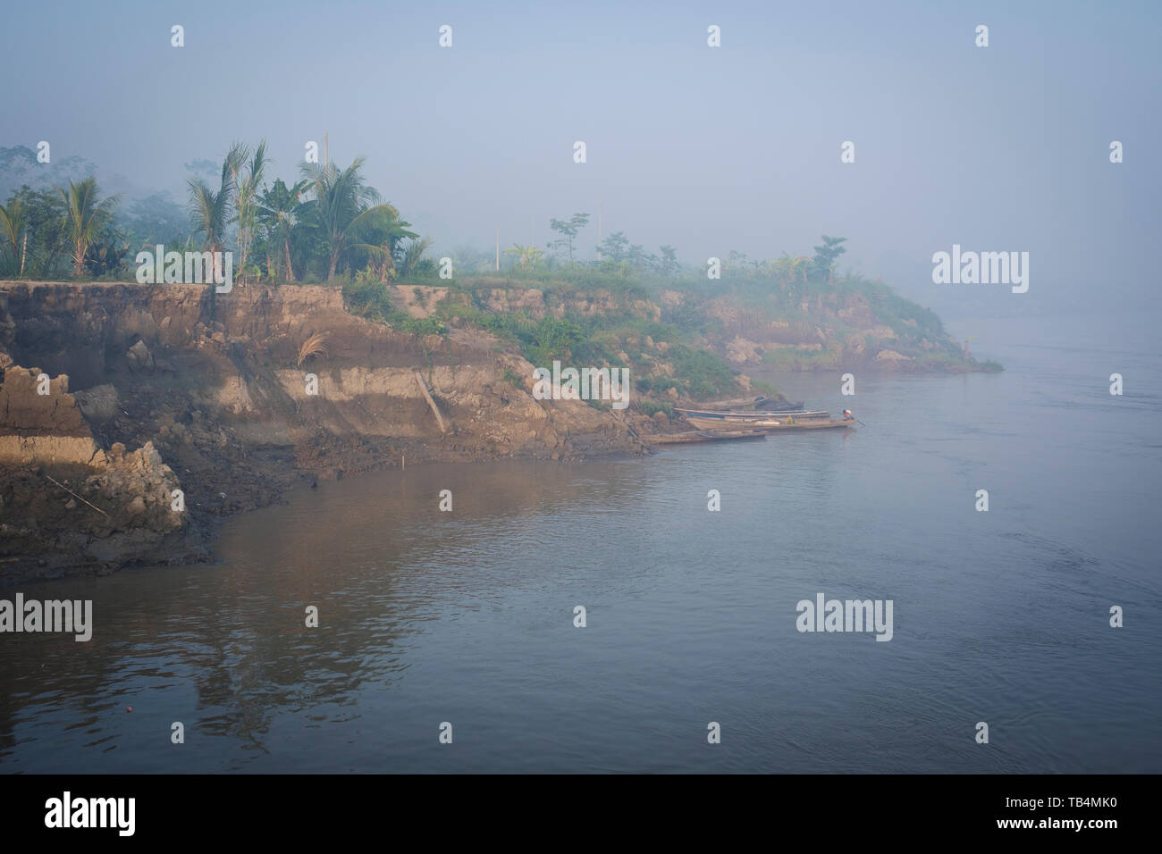 Misty morning in the Ucayali River seen from the ferry Iquitos-Pucallpa ...