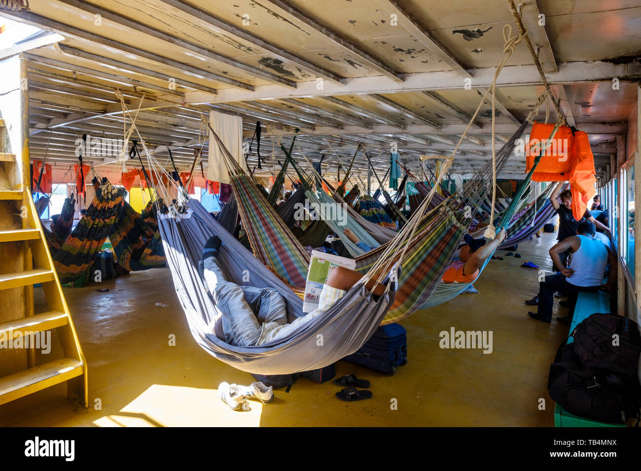Passengers on their hammocks on the Henry III ferry on the Iquitos ...