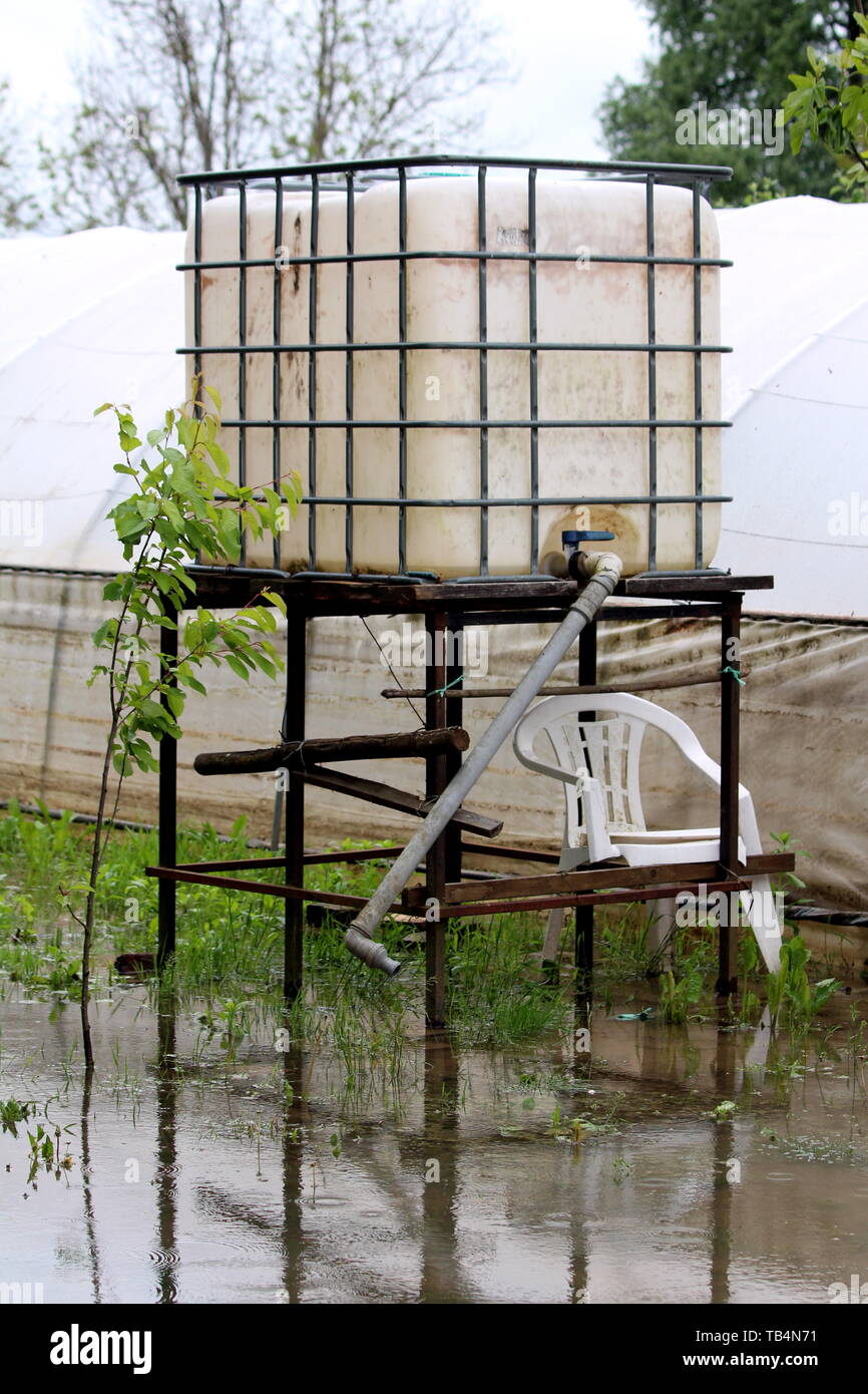 Plastic Tank With Metal Cage at Herman Stpierre blog