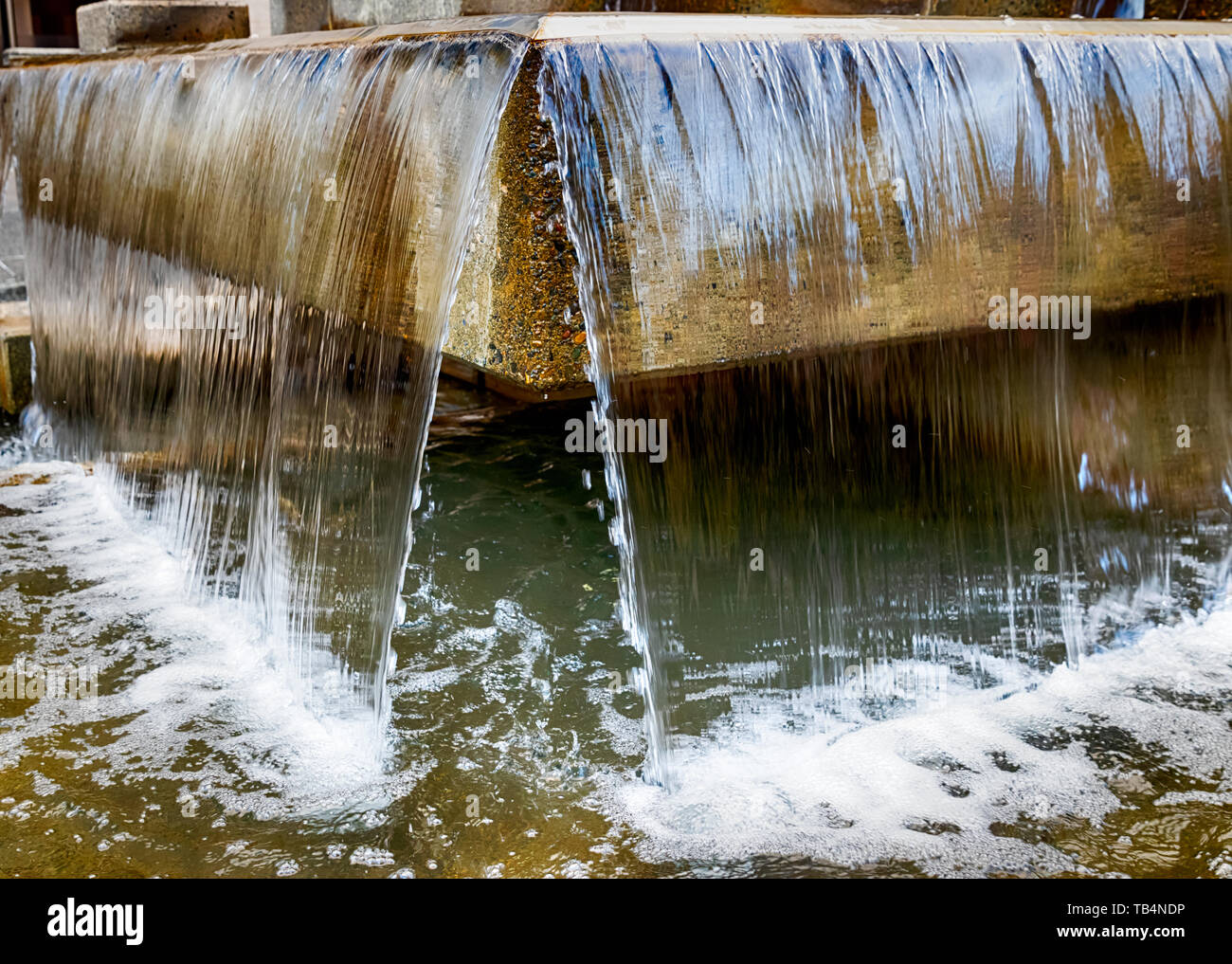 Abstract water fountain close up view with concrete structure Stock ...