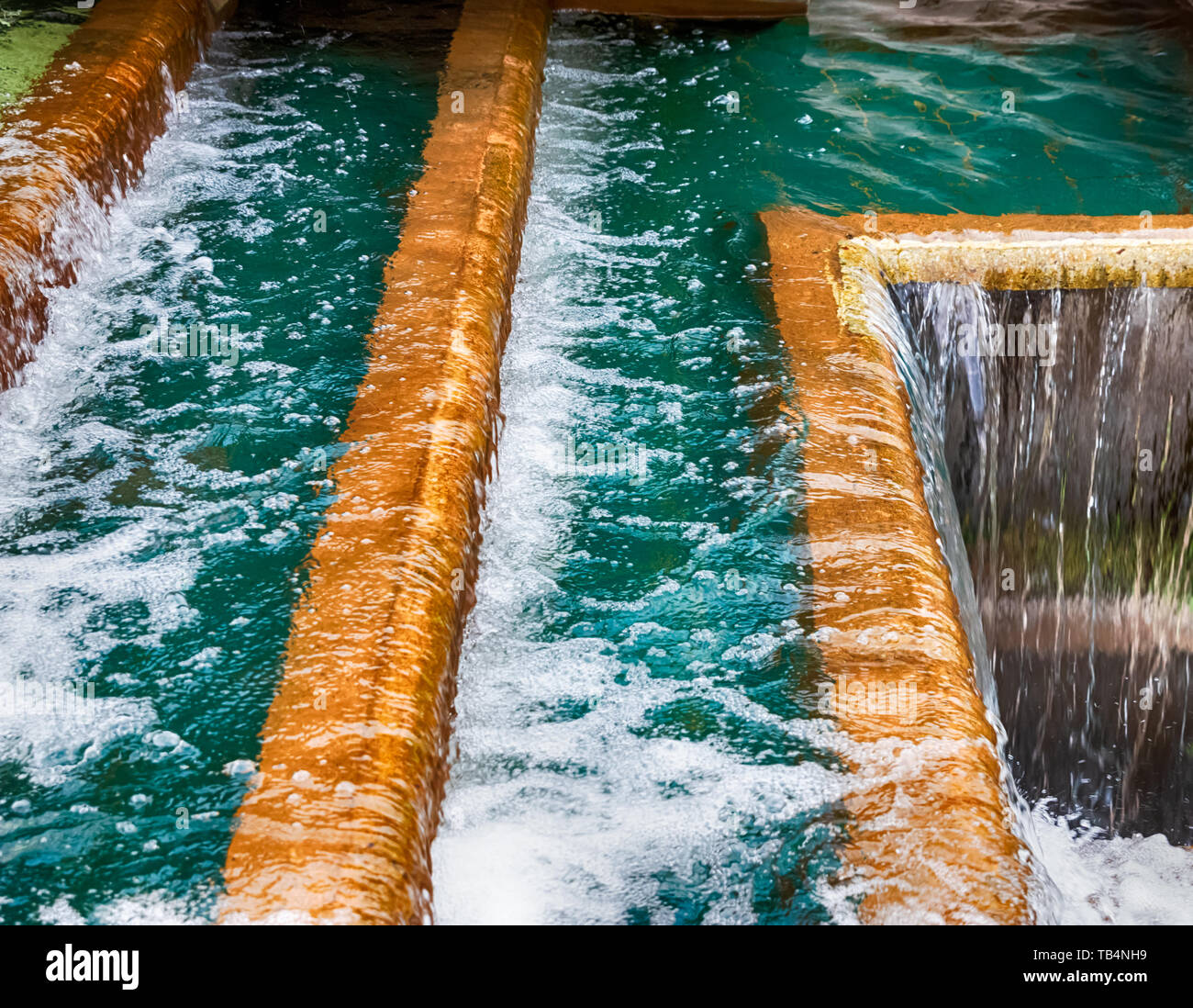 Abstract water fountain close up view with concrete structure Stock ...