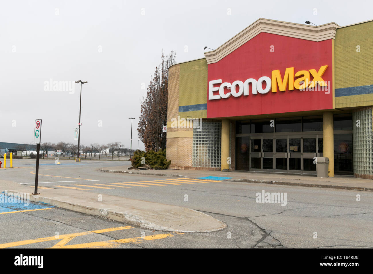 A logo sign outside of a EconoMax retail store location in Montreal ...