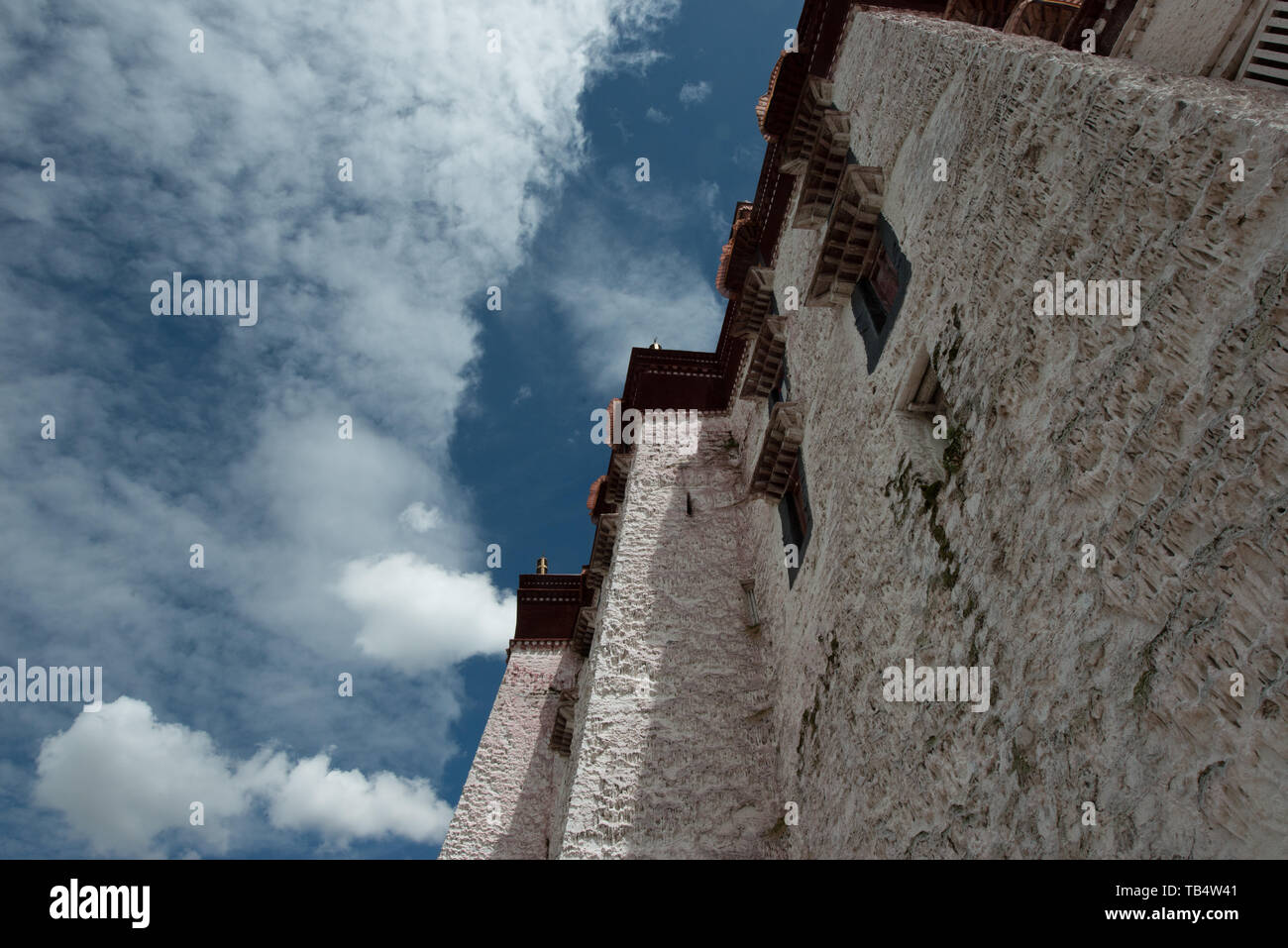 Prayer flags and stones Stock Photo - Alamy
