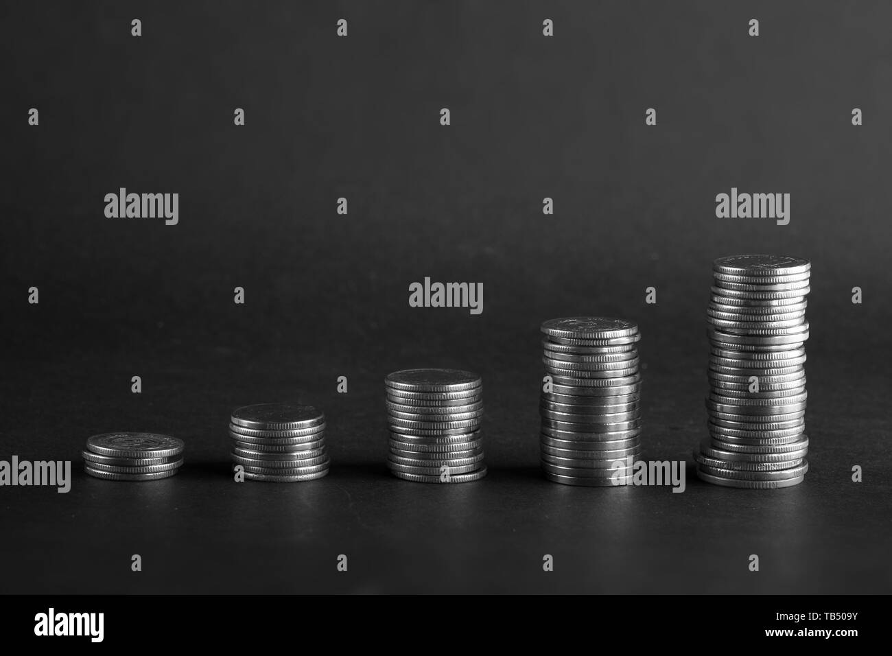 Investment concept background with graph made of coins Stock Photo - Alamy