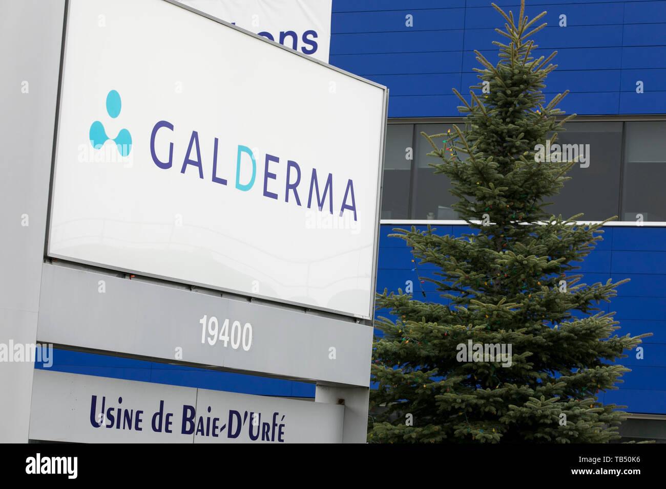 A logo sign outside of a facility occupied by Galderma in Baie-d’Urfé ...