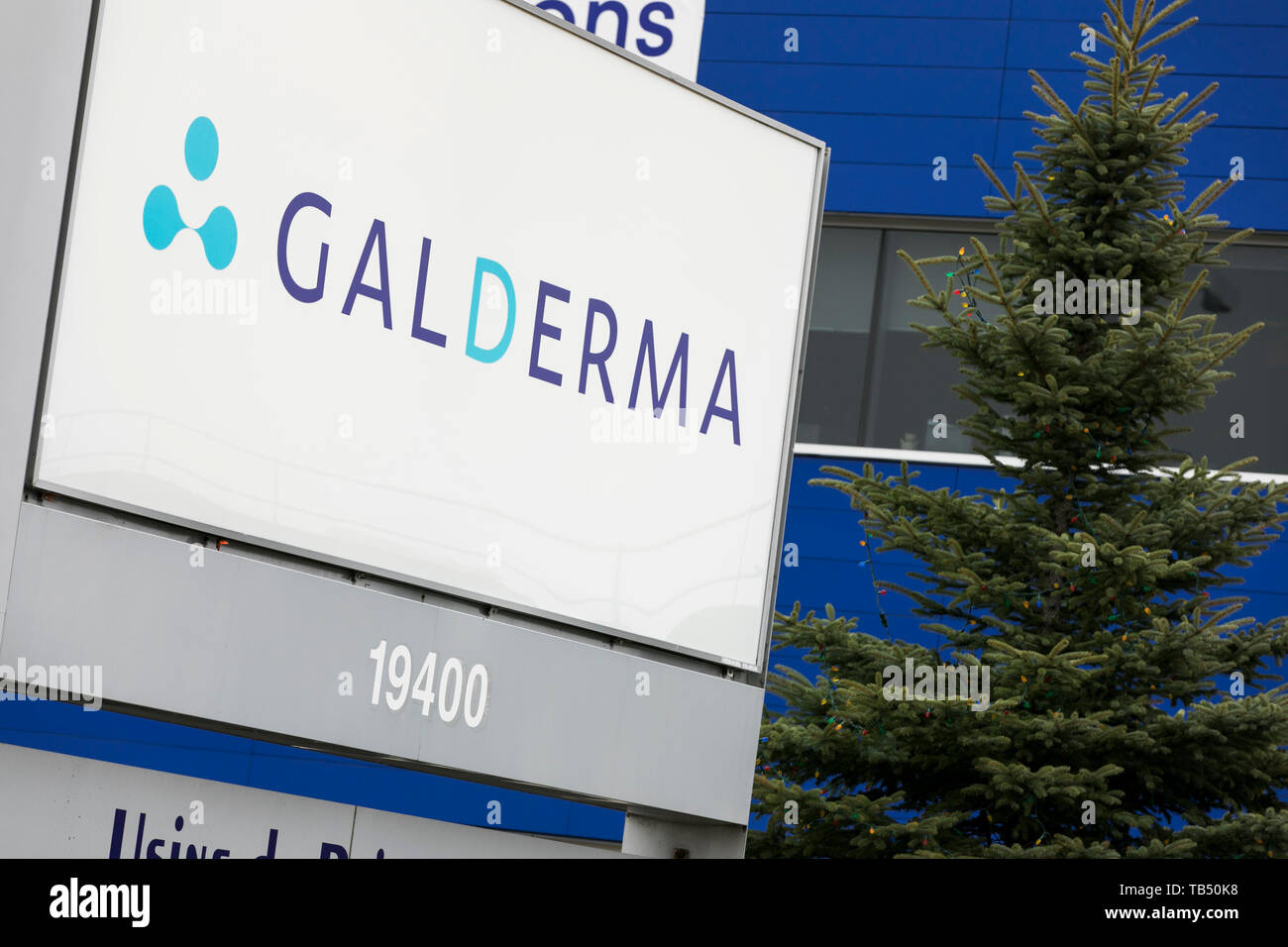 A logo sign outside of a facility occupied by Galderma in Baie-d’Urfé ...
