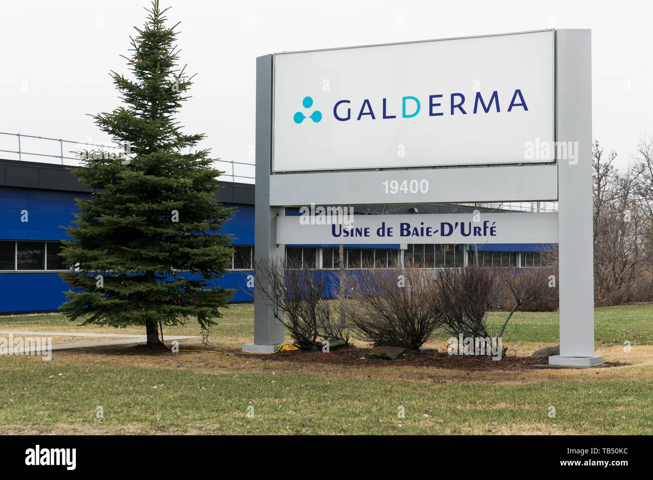 A logo sign outside of a facility occupied by Galderma in Baie-d’Urfé ...