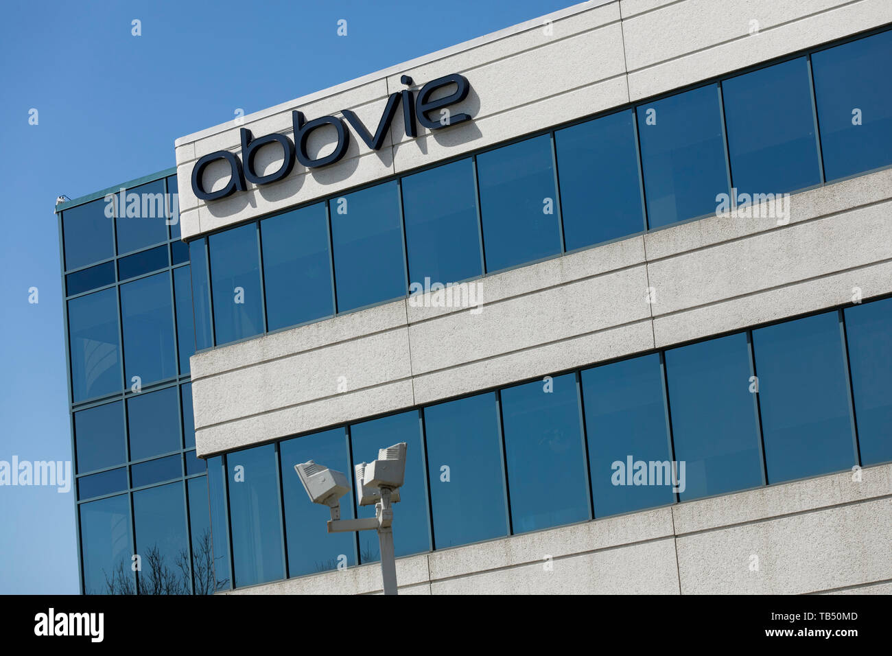 A logo sign outside of a facility occupied by AbbVie in Saint-Laurent ...
