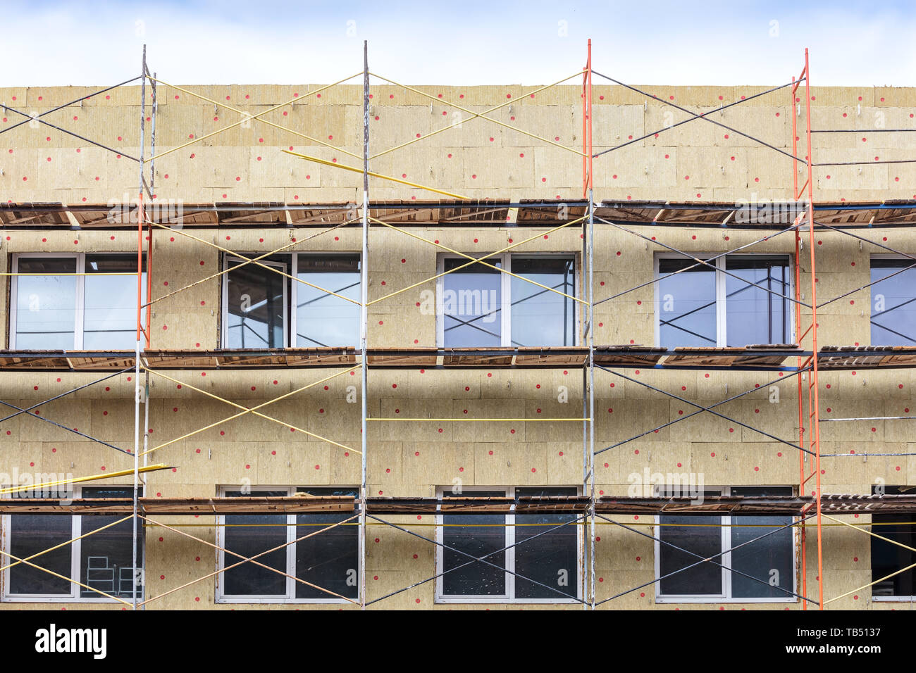 home facade insulation with rock wool. energy efficiency house wall ...