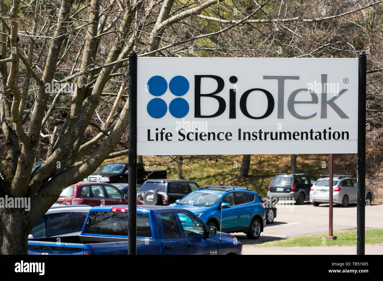 A logo sign outside of the headquarters of BioTek Instruments, Inc., in ...
