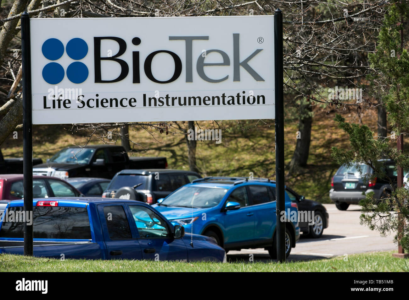 A logo sign outside of the headquarters of BioTek Instruments, Inc., in ...