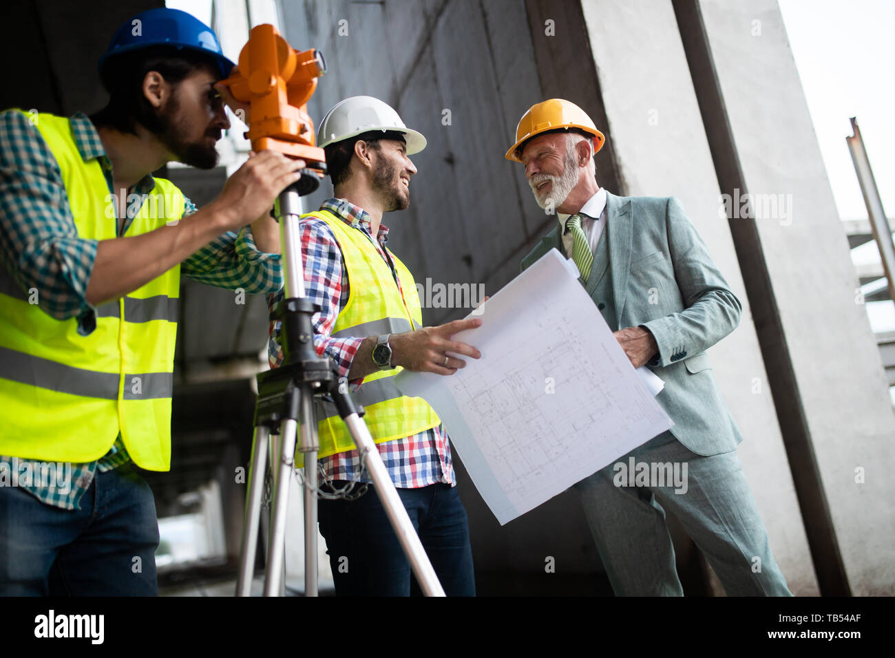 Group of construction engineer working in construction site Stock Photo ...