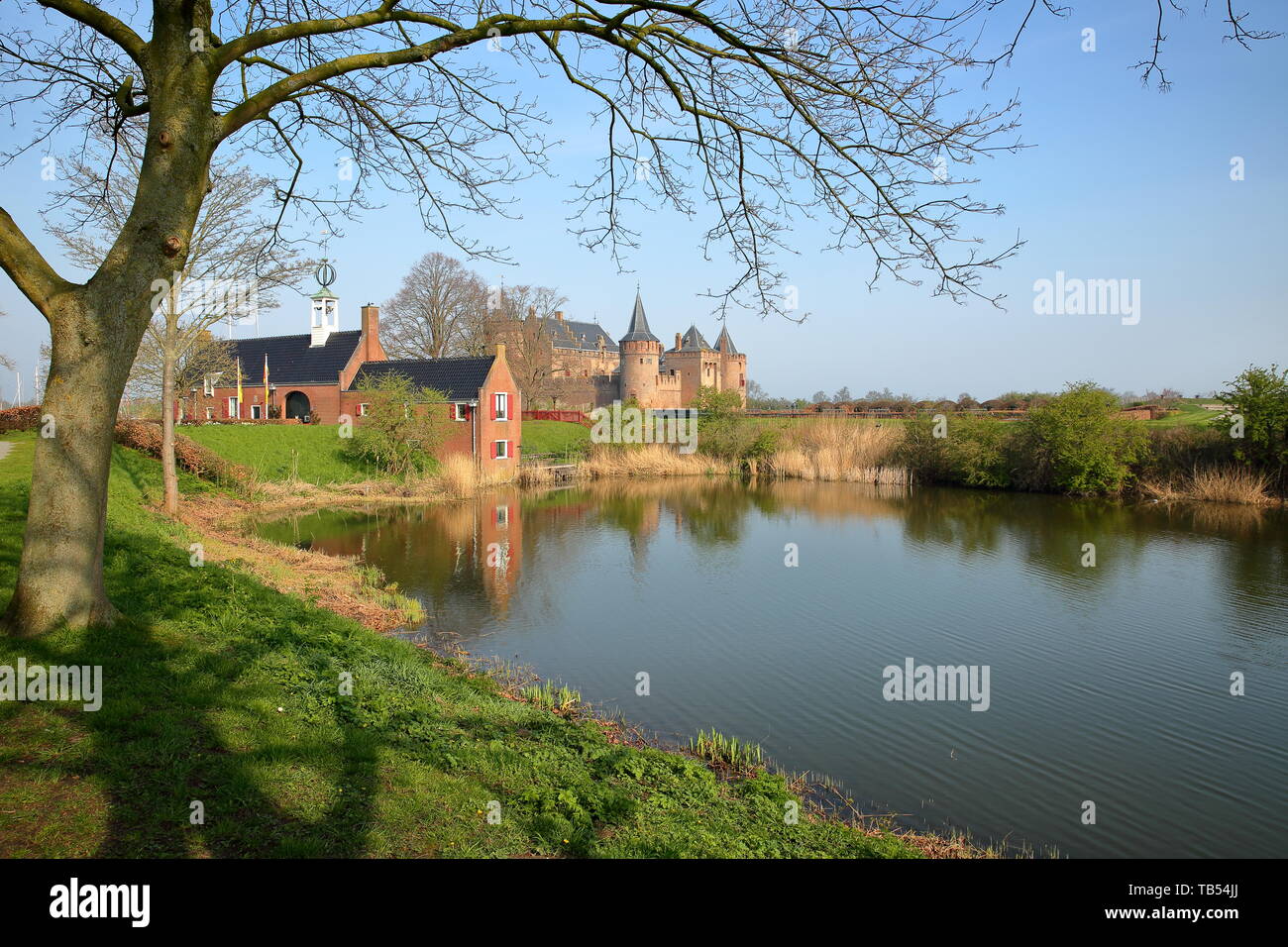 Reflections of Muiderslot Castle, a medieval castle located in Muiden ...