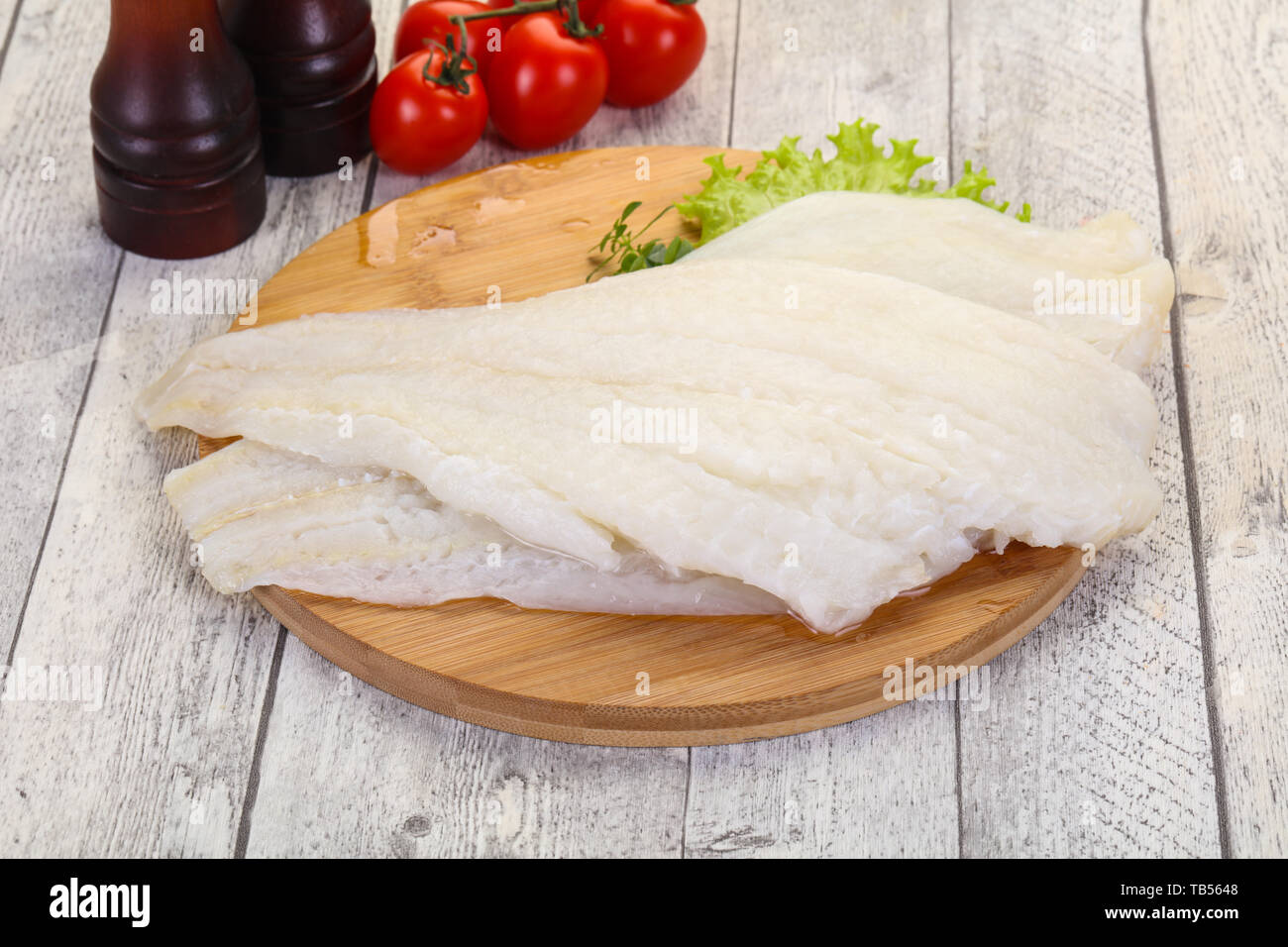 Raw halibut fillet ready for cooking Stock Photo - Alamy