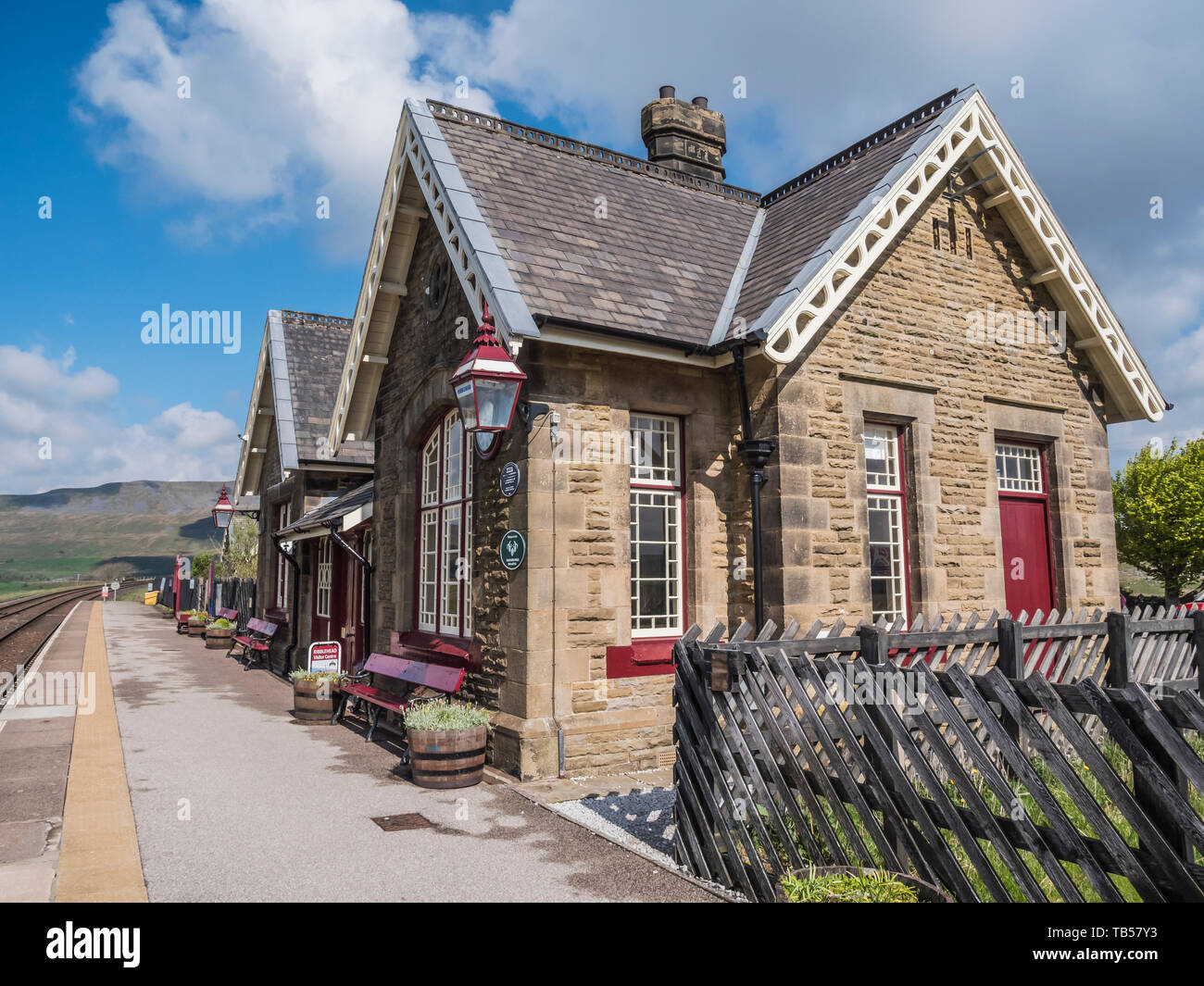The colourful Victorian era Ribblehead Railway Station deep in the ...