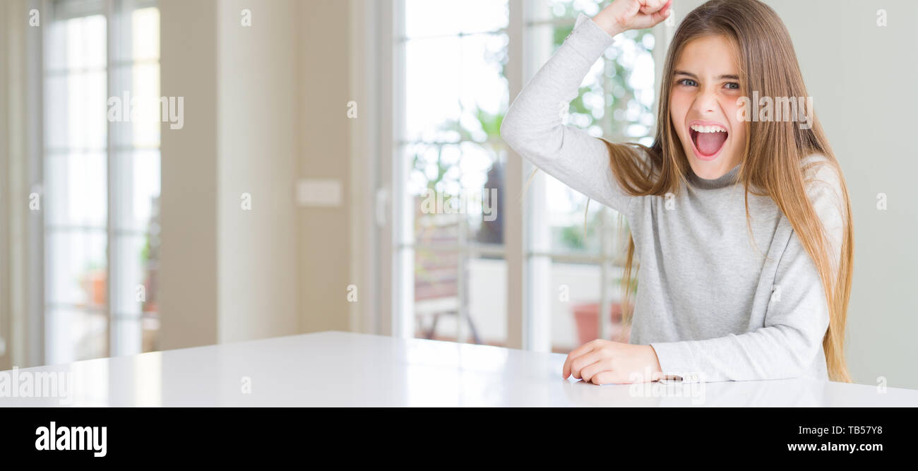 Wide angle picture of beautiful young girl kid wearing casual sweater ...