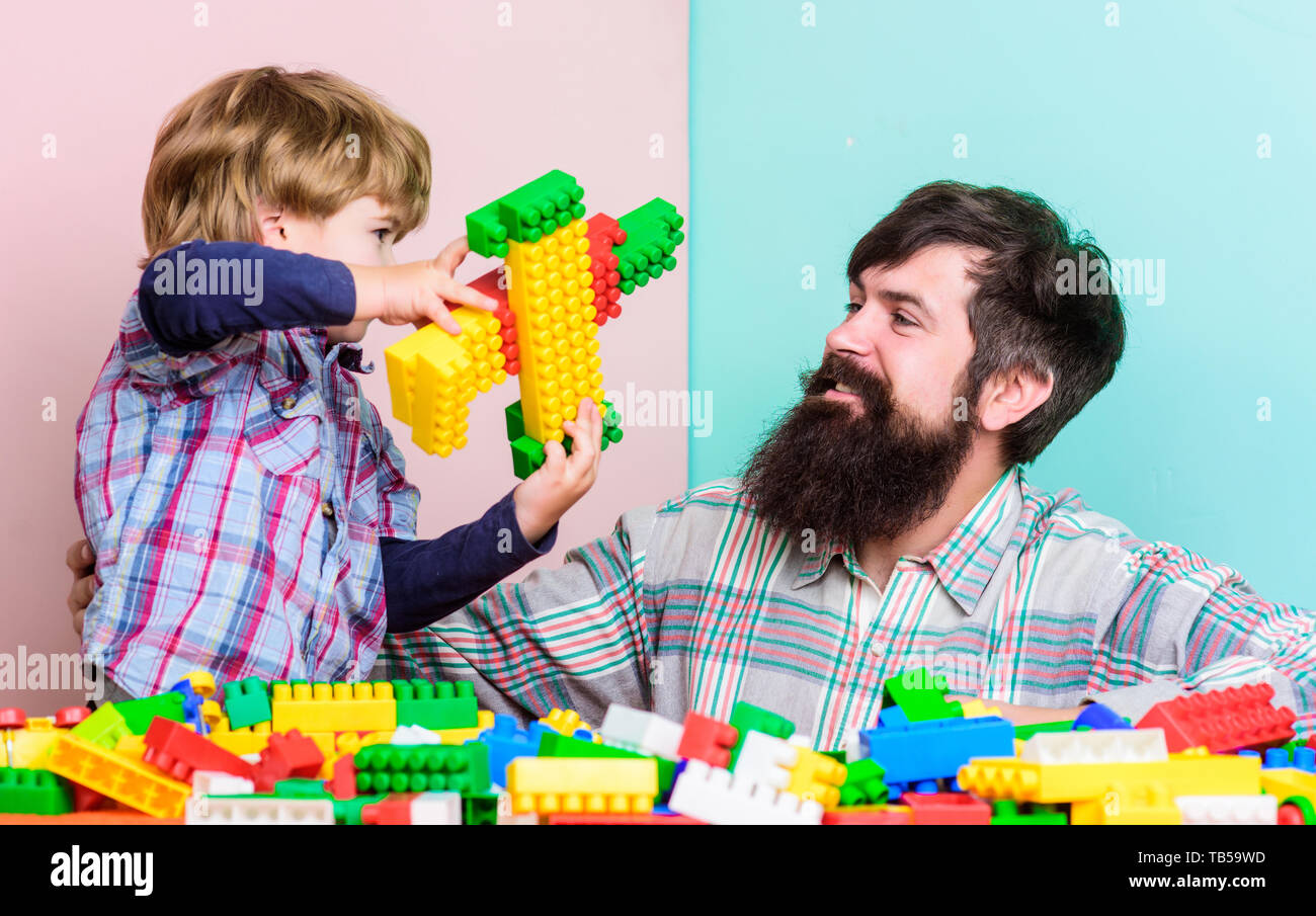 Father leader showing boy how grow into successful man. Dad and kid ...