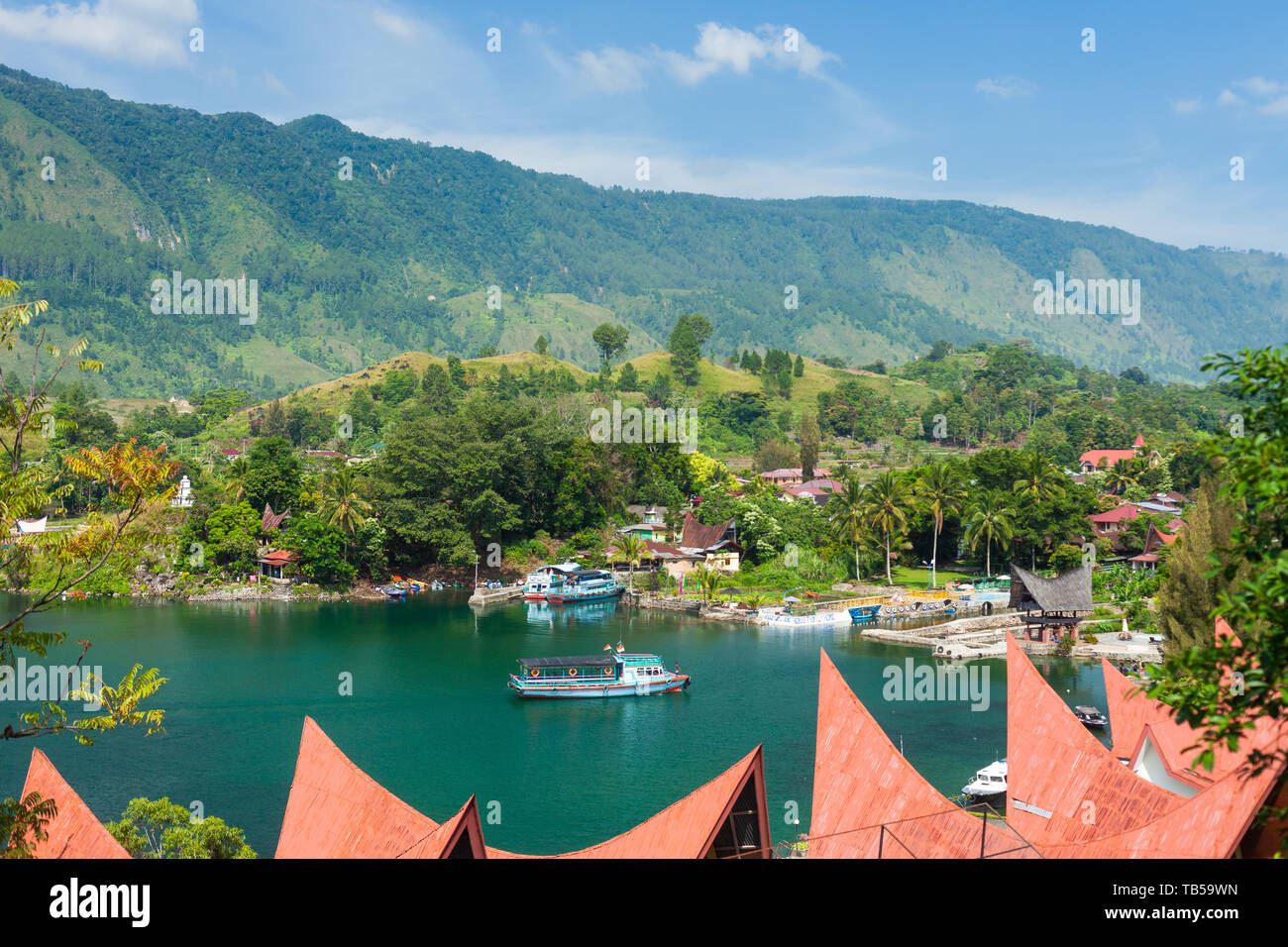 Traditional Batak roof architecture in Tuk Tuk on Samosir Island, Lake ...