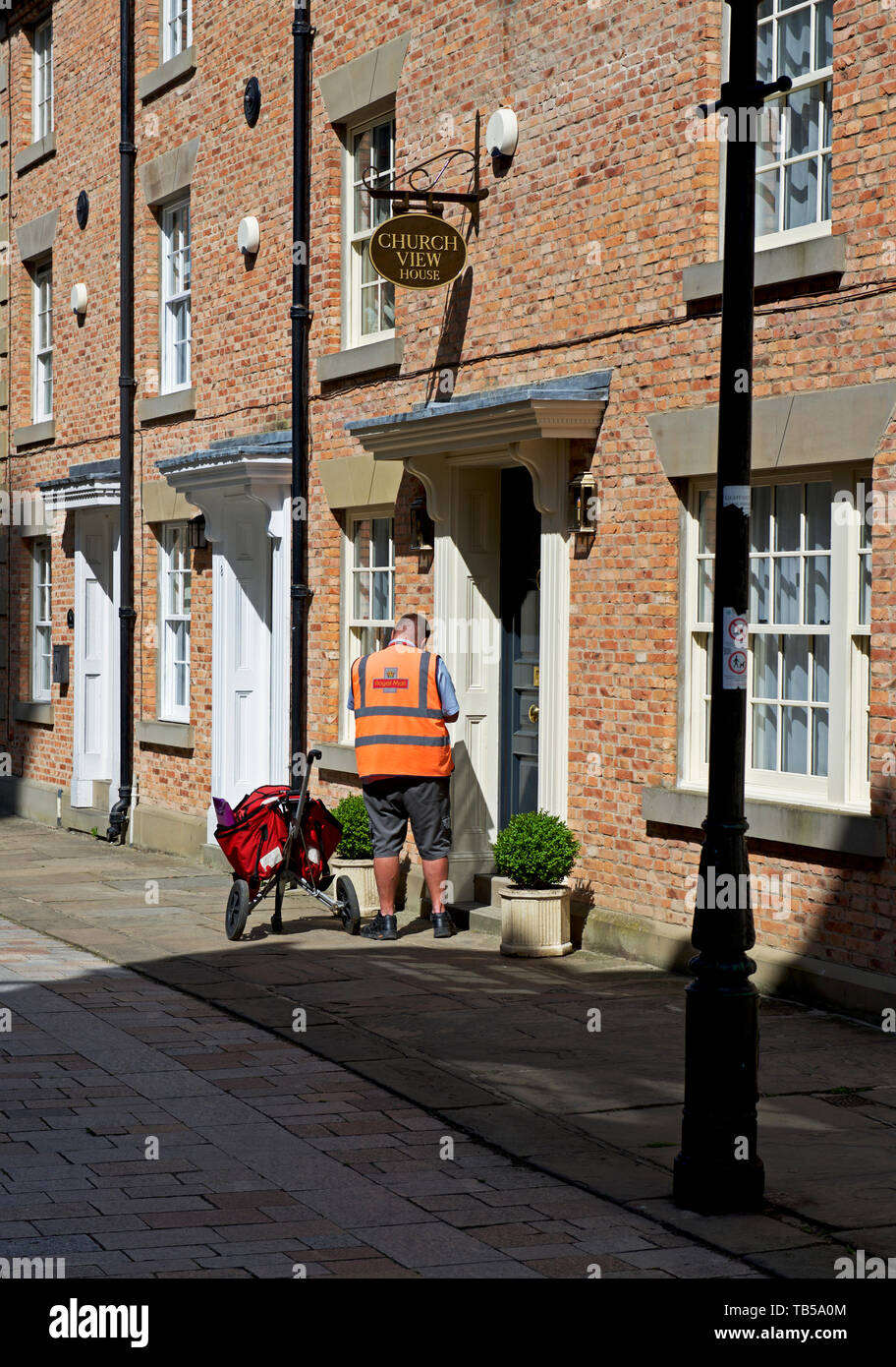 English postman uniform hi-res stock photography and images - Alamy