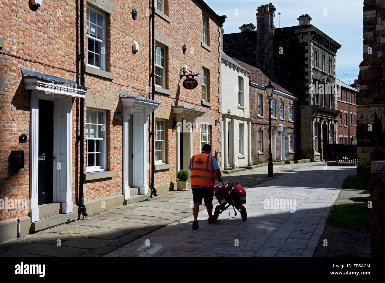 English postman uniform hi-res stock photography and images - Alamy