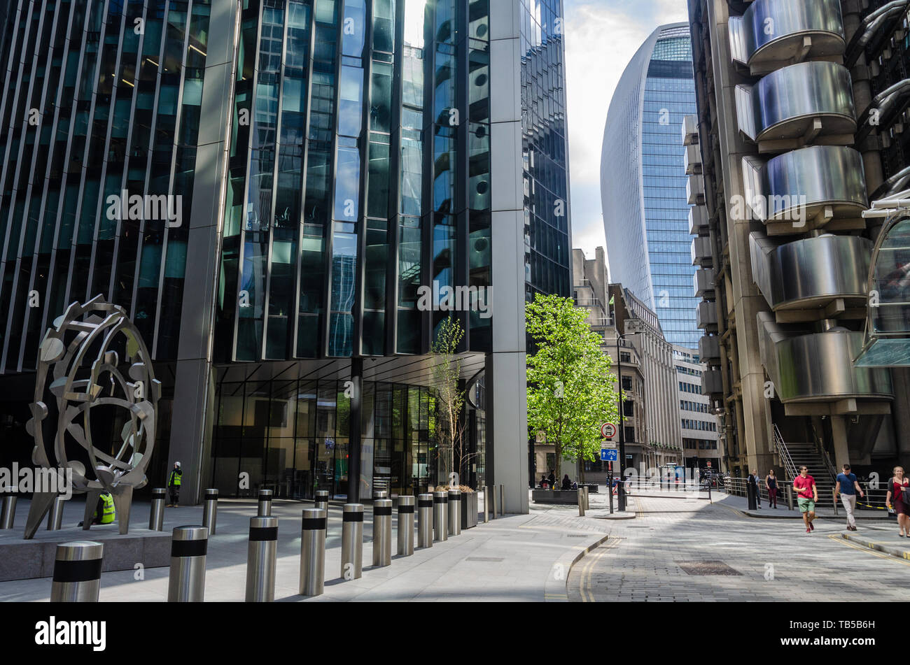 A view down Lime Street in the Financial District in London featuring ...
