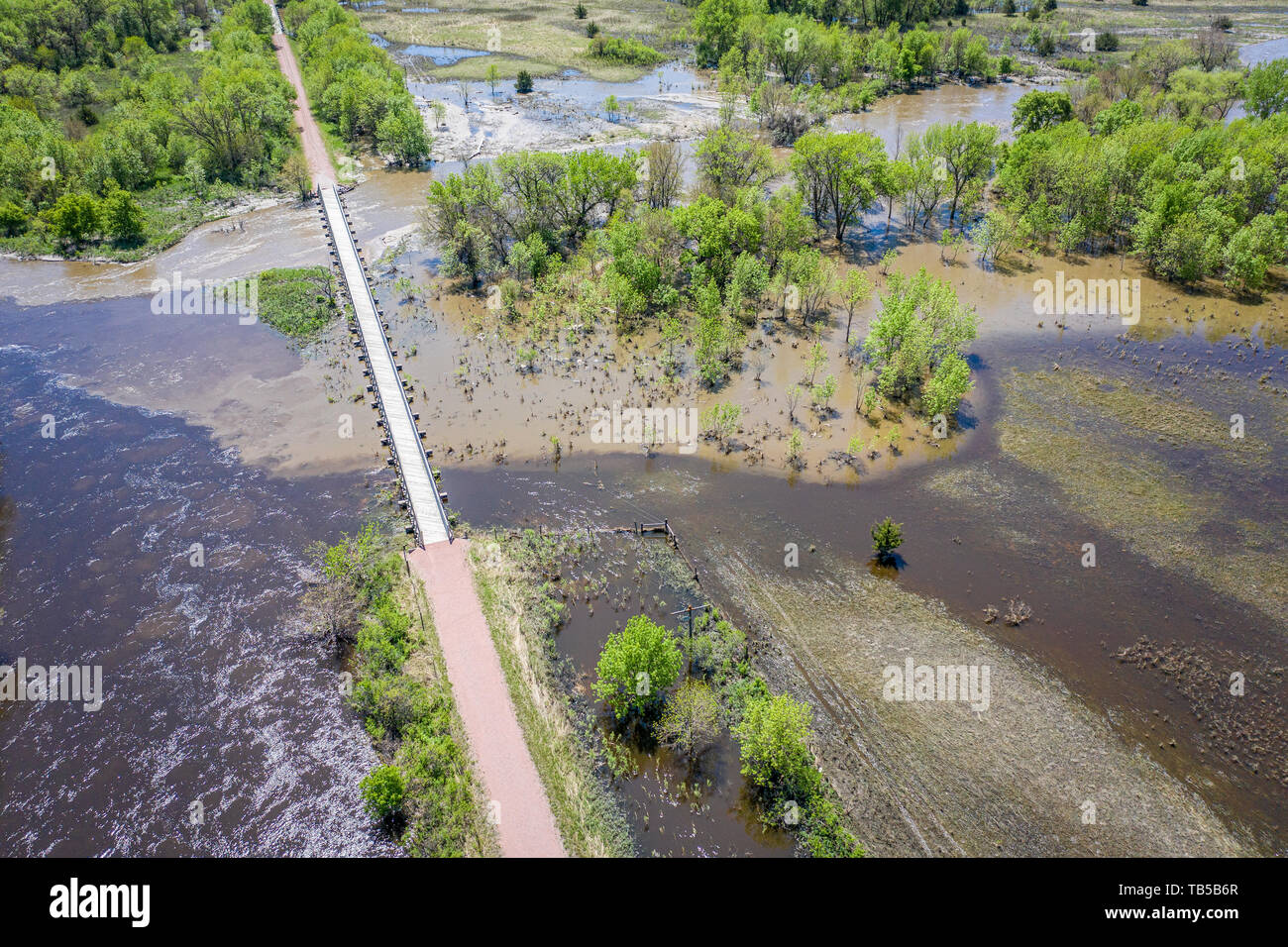 multi-use recreational Cowboy Trail crosses the flooded Elkhorn RIver ...