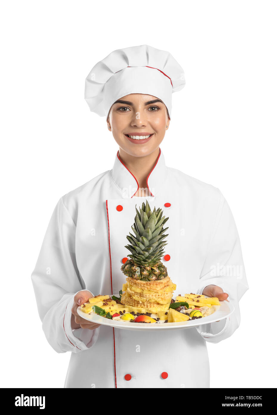 Young female confectioner with tasty dessert on white background Stock ...