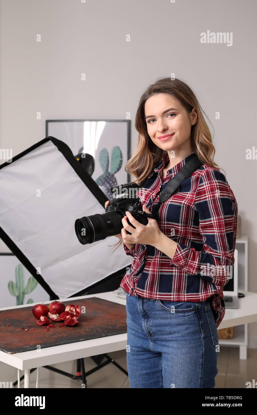 Portrait of female food photographer in home studio Stock Photo - Alamy