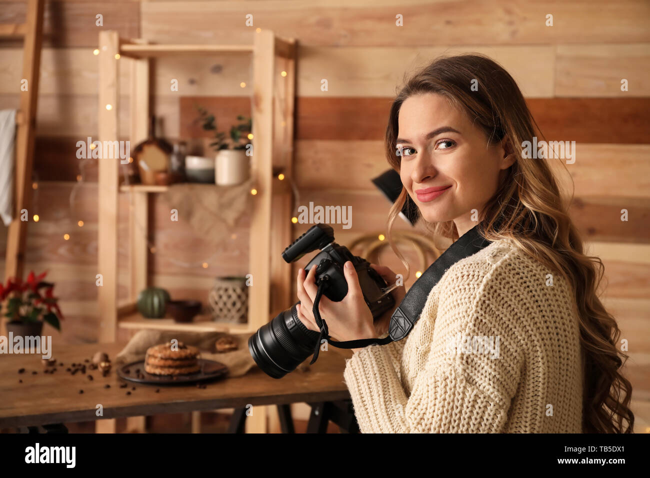 Portrait of female food photographer in home studio Stock Photo - Alamy