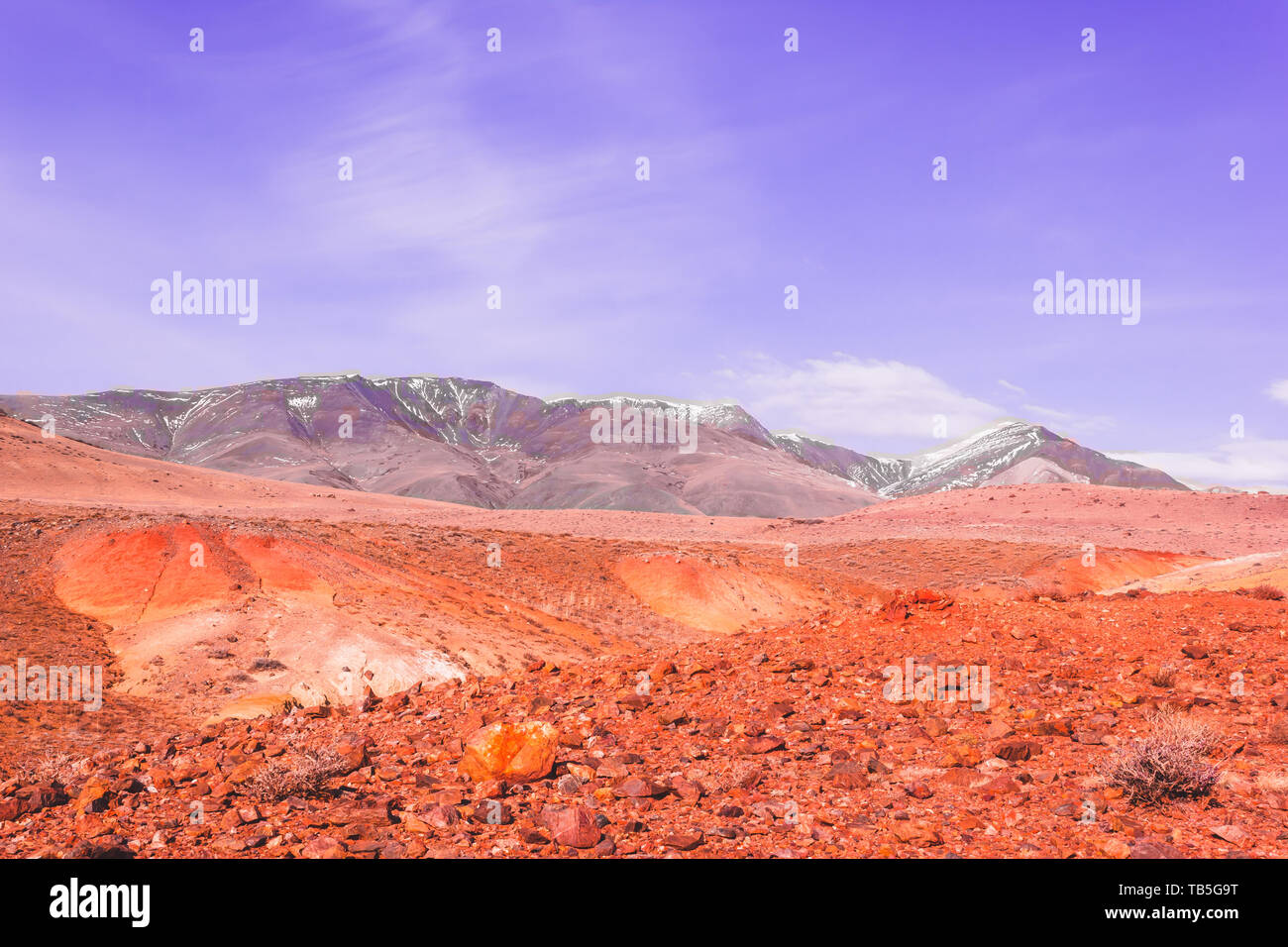 Steppe plain with yellow sand. Yellow soil under hot sun. Mountain ...