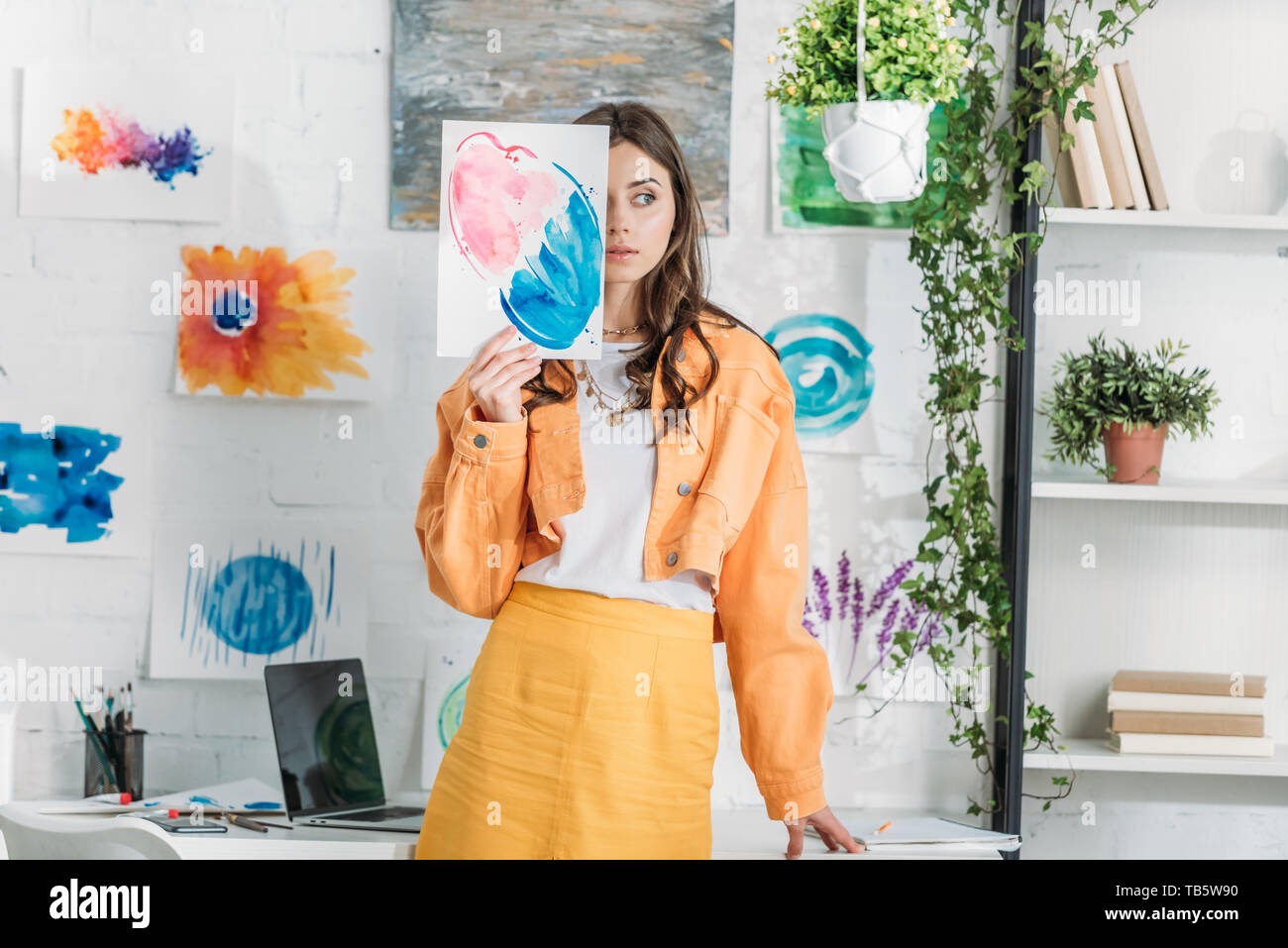 Hiding behind painting hi-res stock photography and images - Alamy