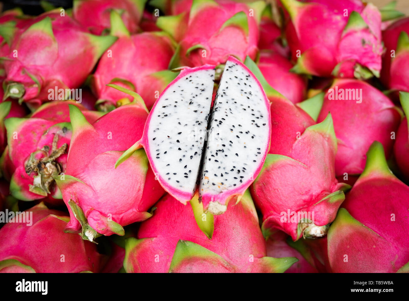 dragon fruit texture background for sale in the market Stock Photo - Alamy