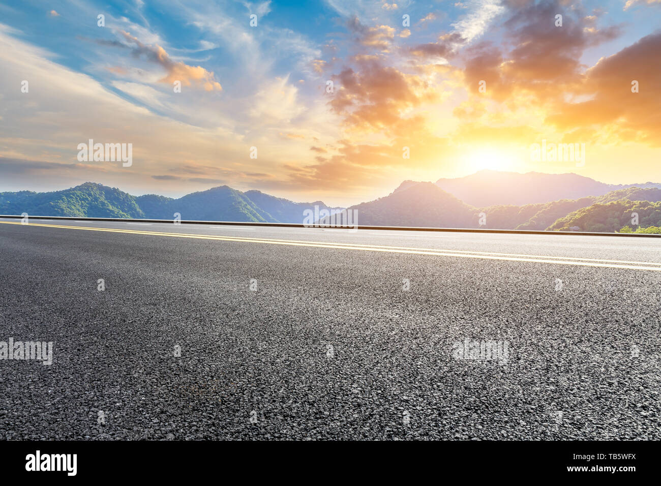 Empty highway road and beautiful mountain with clouds landscape Stock ...
