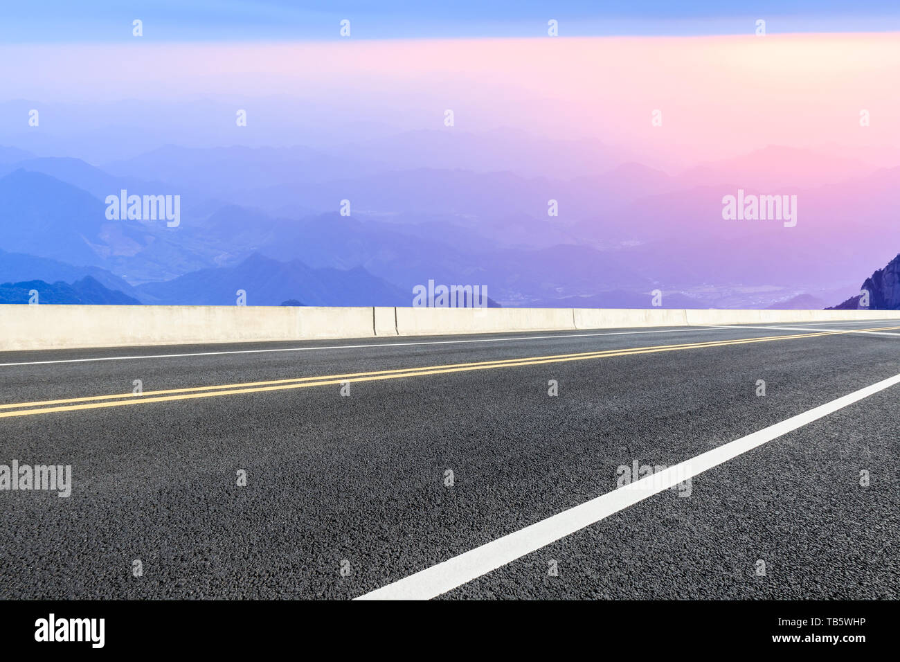 Asphalt highway road and beautiful huangshan mountains nature landscape ...