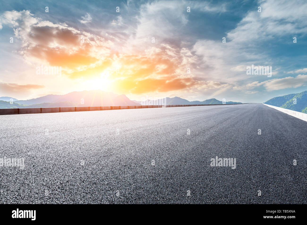 Empty highway road and beautiful mountain with clouds landscape Stock ...