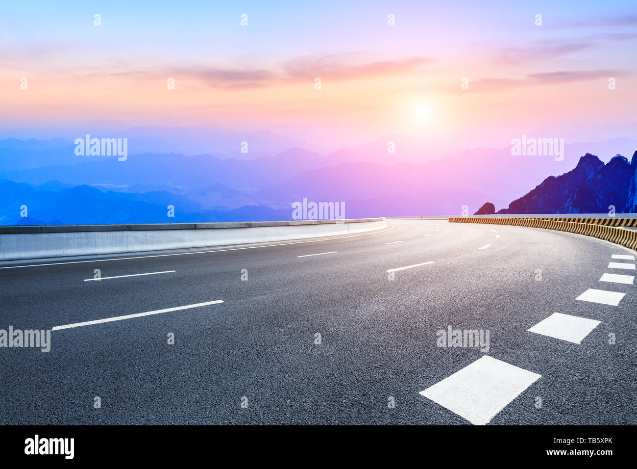 Asphalt highway road and beautiful huangshan mountains nature landscape ...