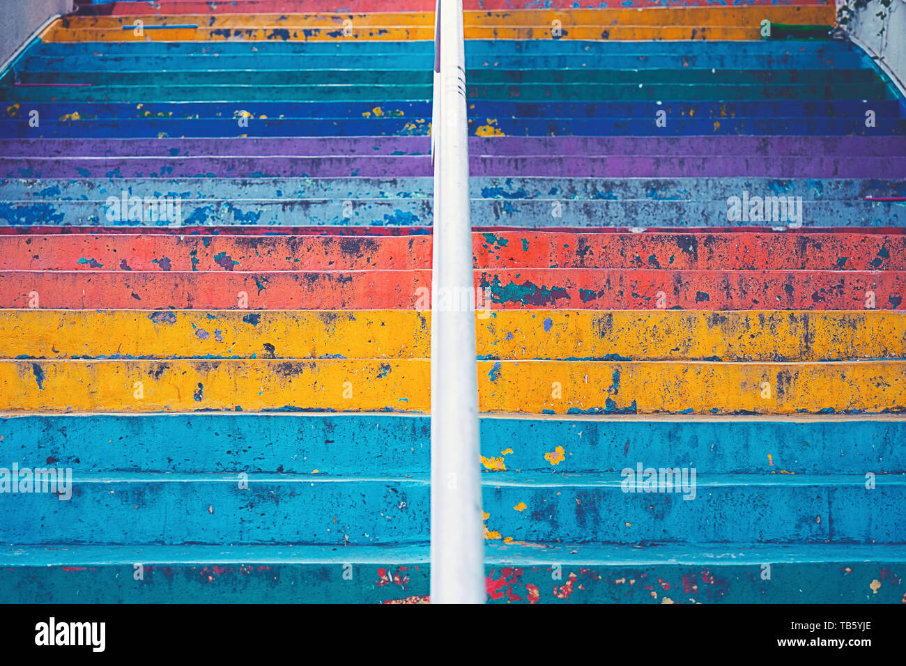 Stairs painted in rainbow colors background Stock Photo - Alamy