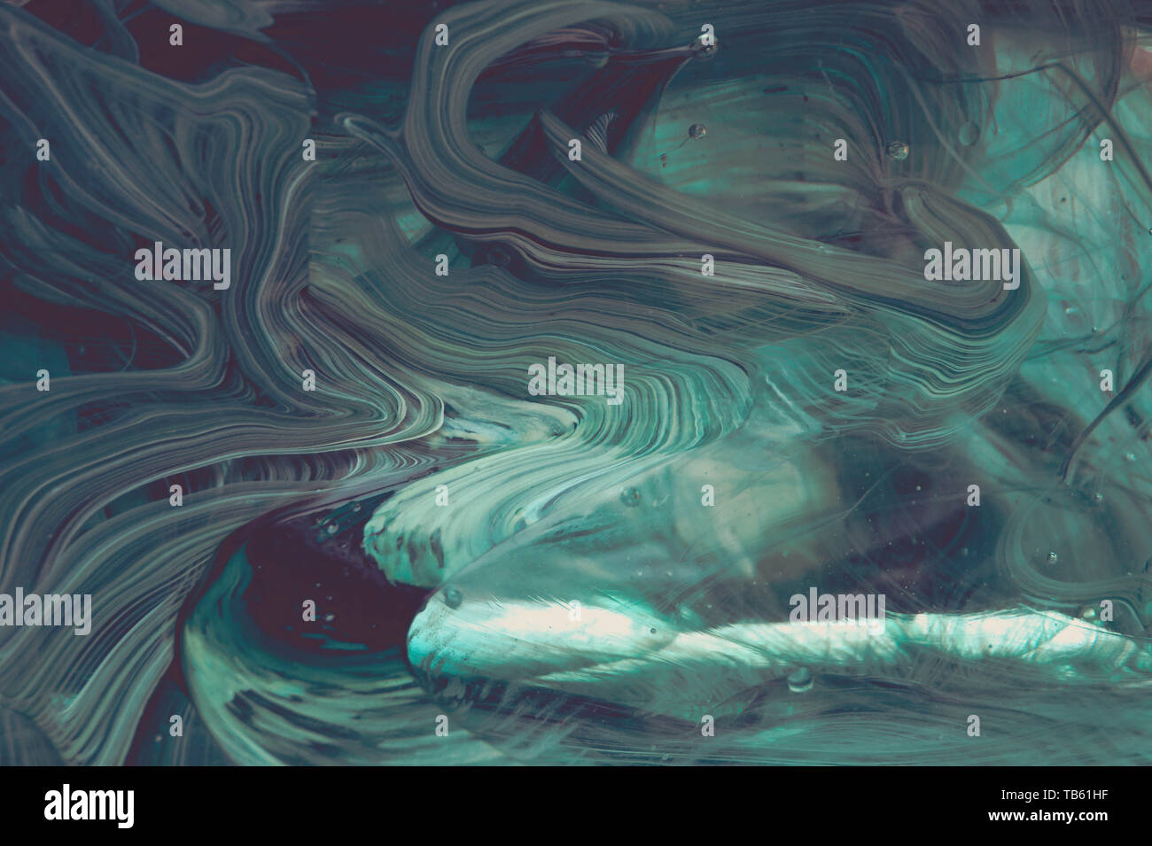 Abstract art with emulsions of oil paint in water Stock Photo - Alamy