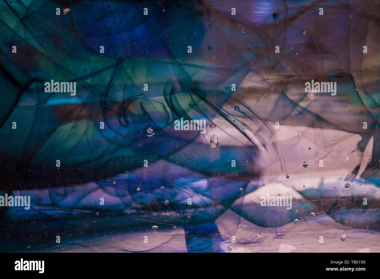 Abstract art with emulsions of oil paint in water Stock Photo - Alamy