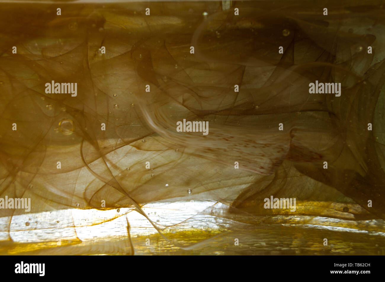 Abstract art with emulsions of oil paint in water Stock Photo - Alamy