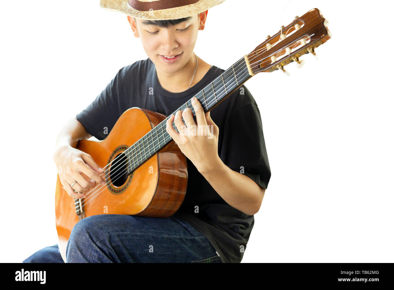 Asian man playing a classic guitar isolated in white background Stock ...