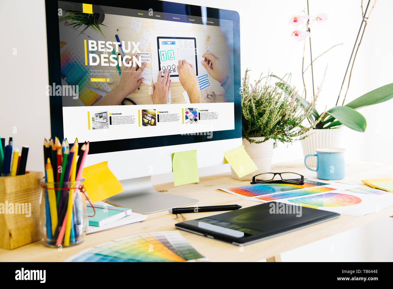 Graphic design studio showing ux design website Stock Photo - Alamy
