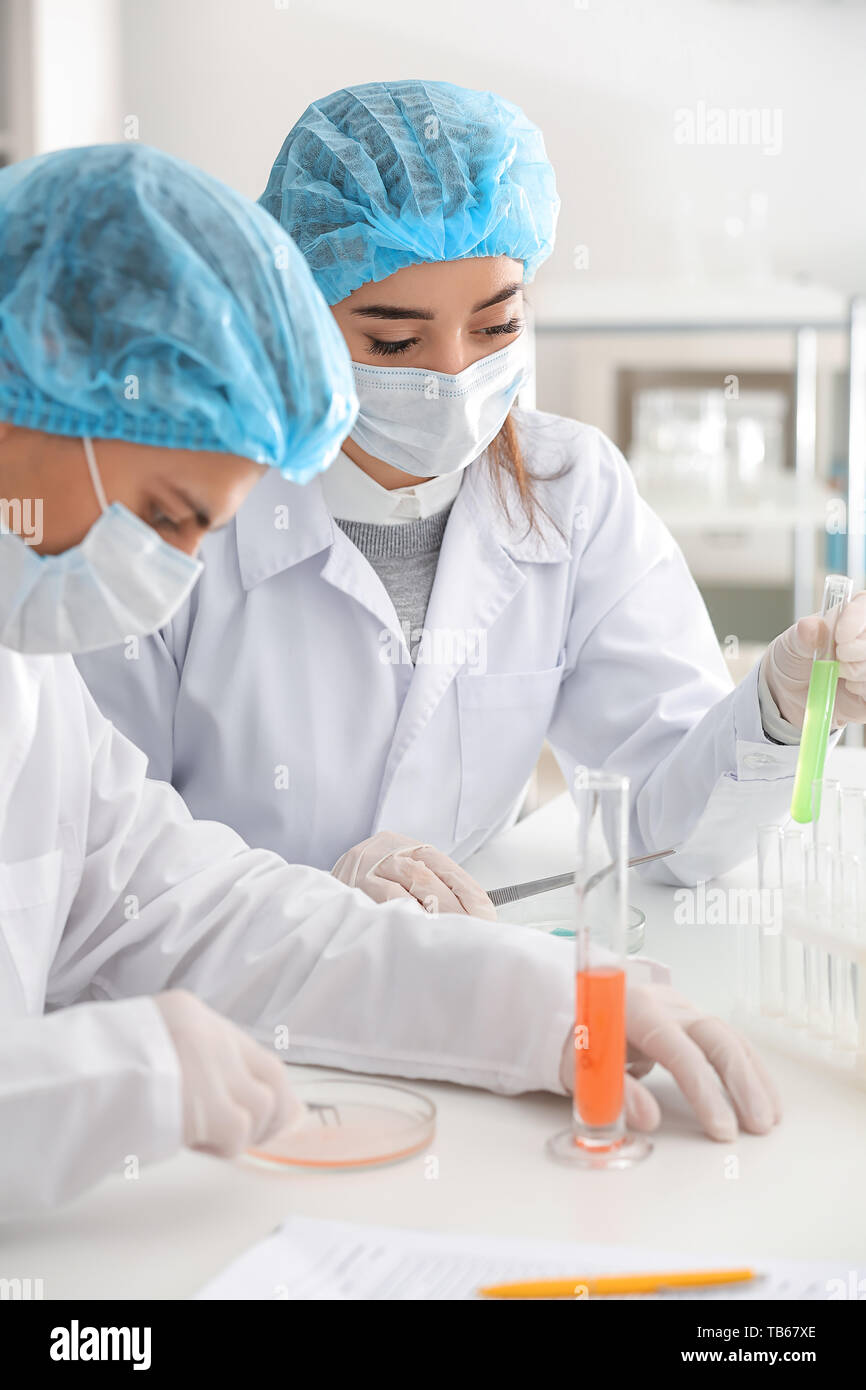 Female doctors studying test results hi-res stock photography and ...